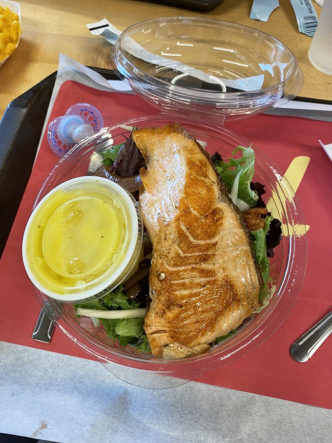Even the salads mean business here. This perfectly seared salmon atop fresh greens proves healthy options don't have to be punishment for dietary sins.