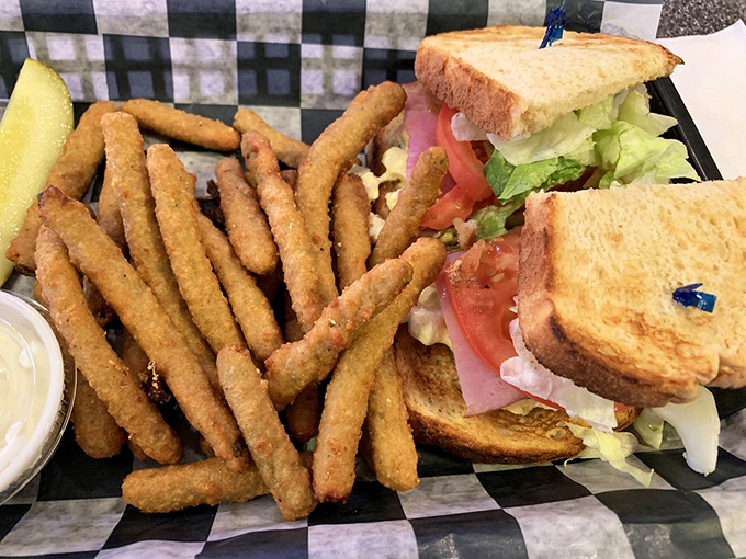 When a sandwich and fried green beans get together, it's not just a meal—it's proof that sometimes the best relationships are the unexpected ones.
