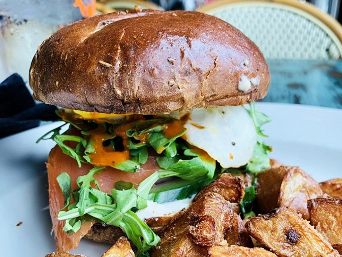 This isn't just a sandwich &ndash; it's architecture with purpose, where each layer contributes to a masterpiece that requires both hands and your full attention.