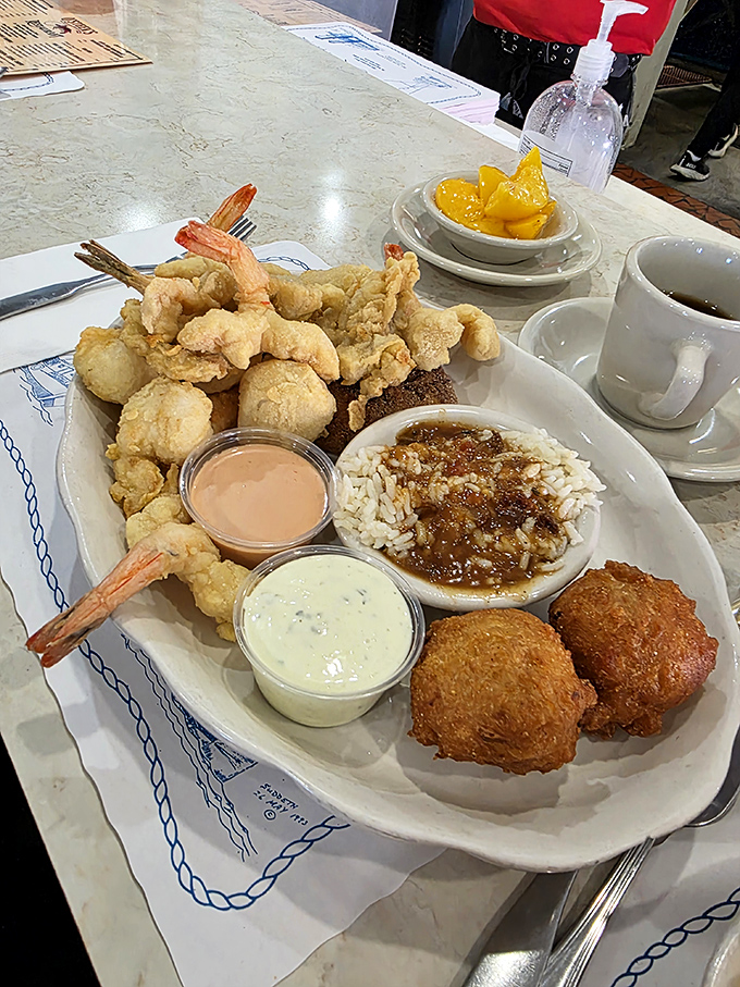 The seafood plate that answers the eternal question: "Why choose one when you can have it all?"