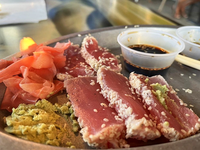 Seared tuna that's dressed better than most Florida tourists. The sesame crust adds just enough crunch to make your taste buds stand at attention.