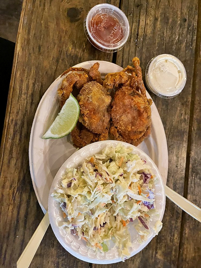 A plate that celebrates the bounty of Florida waters. Crispy seafood paired with creamy coleslaw&mdash;comfort food with an ocean view.