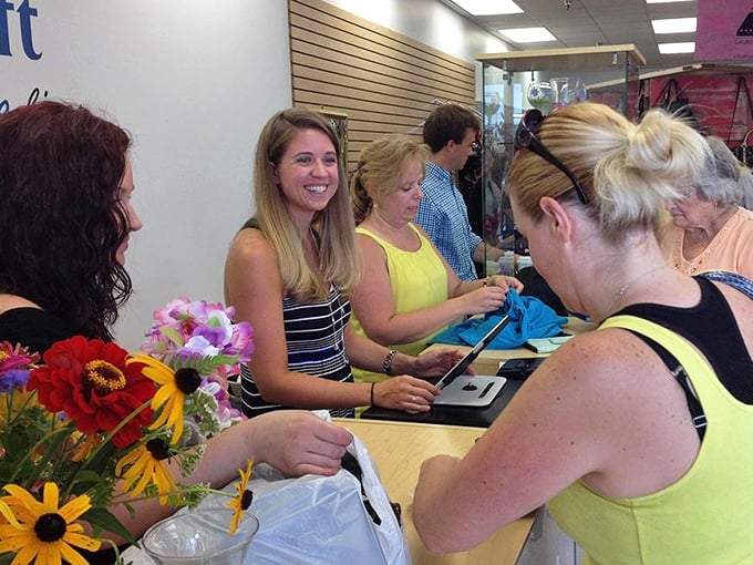 The checkout crew: where transactions become conversations and regulars are greeted like the old friends they've become over countless treasure hunts.