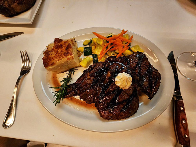 Here's a steak that means serious business, charred to perfection and accompanied by vegetables that actually complement the star.