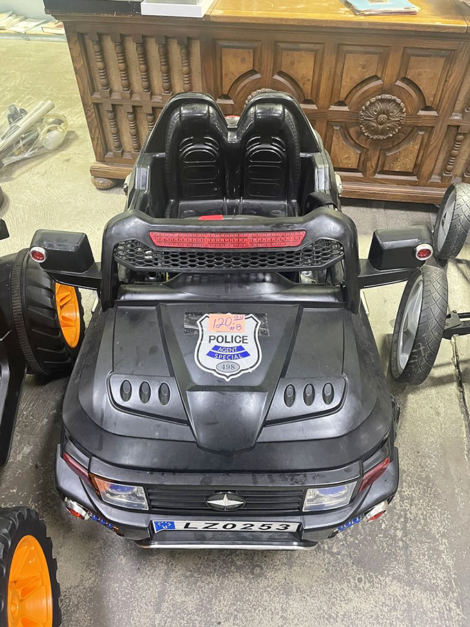 Even toy police cars find second chances here, ready to chase new adventures in different driveways.