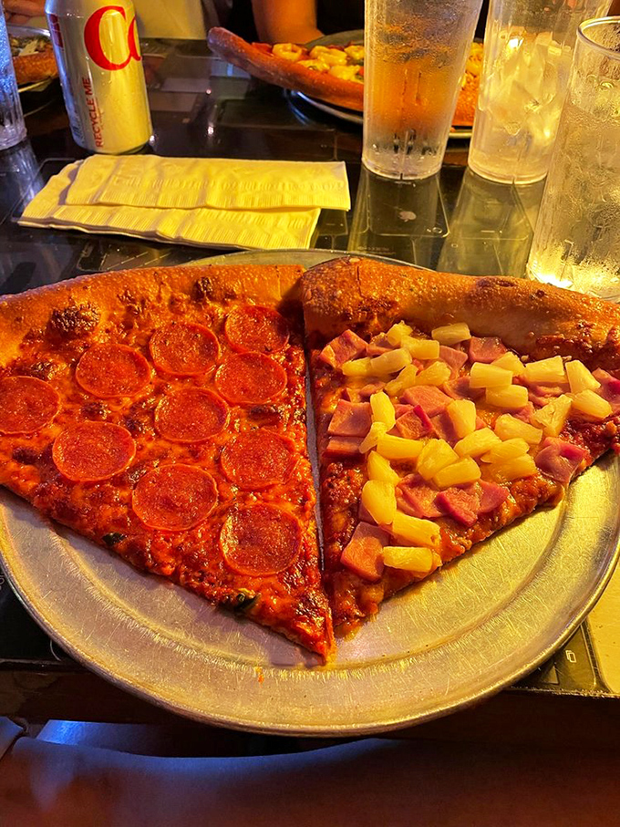 The Sophie's Choice of pizza slices&mdash;pepperoni perfection on one side, tropical ham and pineapple on the other. Life's too short not to try both.