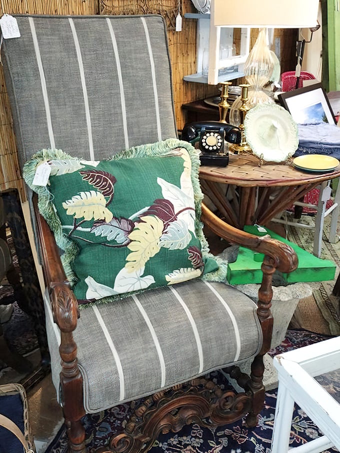 Not just a chair, but a time machine with armrests. That tropical cushion says "I vacation in interesting places" without booking a flight.