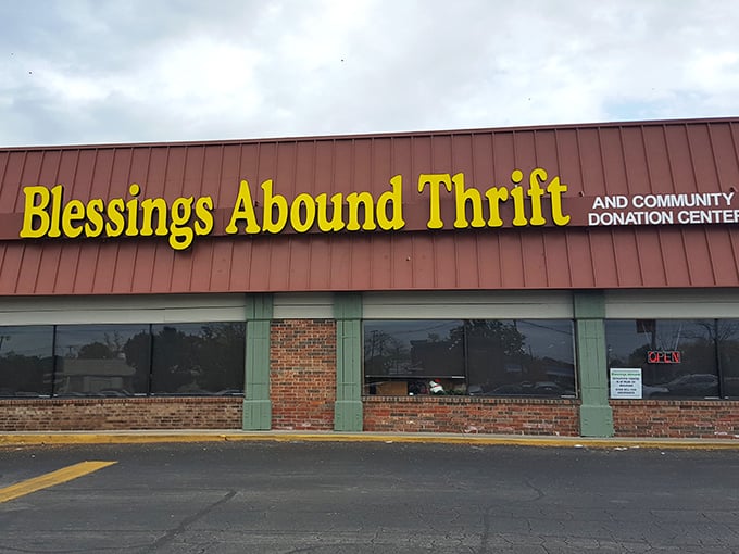 Blessings Abound's cheerful yellow sign brightens even cloudy days. The name promises an abundance of treasures waiting to be discovered.