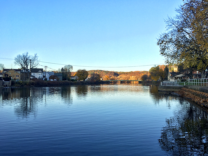 The serene waters of the West Branch Susquehanna River reflect Clearfield's peaceful surroundings, offering residents scenic views and outdoor recreation just steps from affordable neighborhoods.