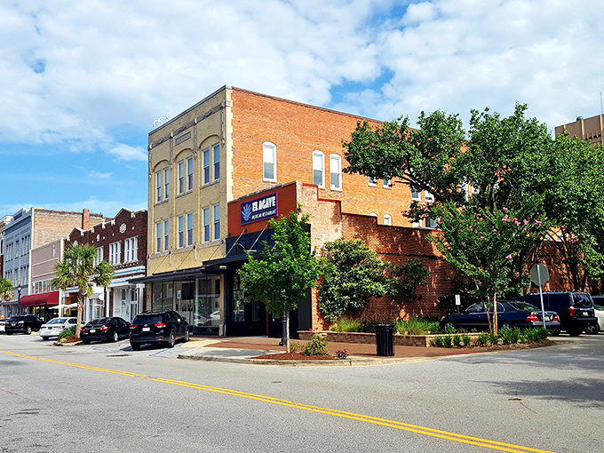 Florence's historic downtown buildings stand proud against blue skies. Your retirement dollars stand taller here too!
