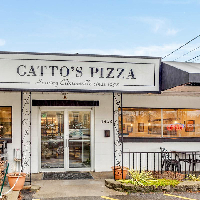 Gatto's clean white storefront &ndash; where pizza has been done right since 1952 without needing to shout about it.