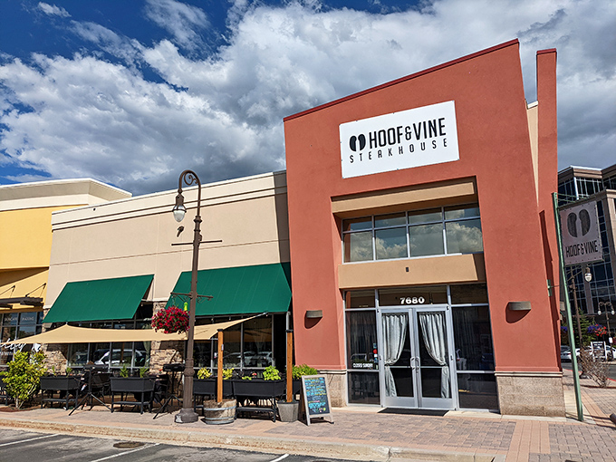 Hoof & Vine's coral-colored building stands out like a juicy medium-rare steak on a white plate. Modern yet inviting, just like their menu.