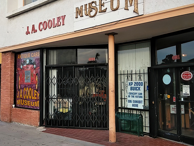 Step back in time at the J.A. Cooley Museum. That vintage storefront is just the first page in this automotive history book!