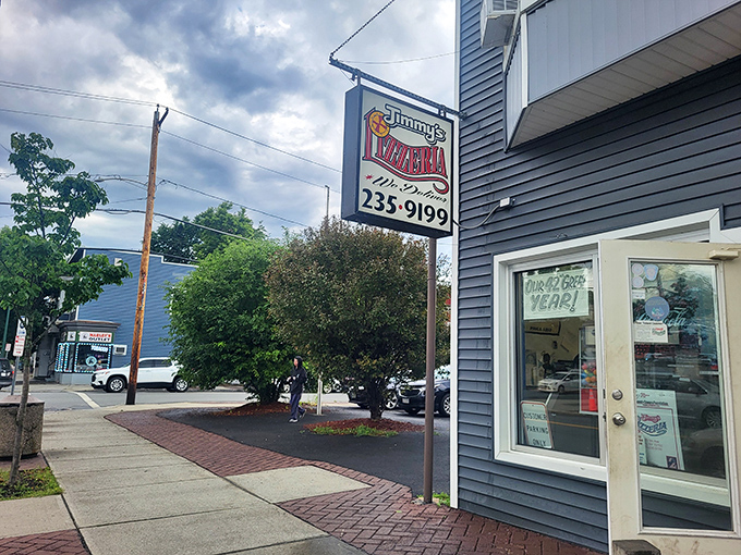 Jimmy's blue exterior hides in plain sight—the Clark Kent of pizzerias, with superhero flavors waiting inside.