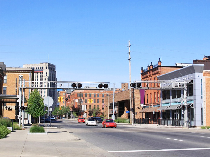 Sunset paints Kalamazoo's skyline in golden hues &ndash; affordable living that looks like a million bucks at dusk!