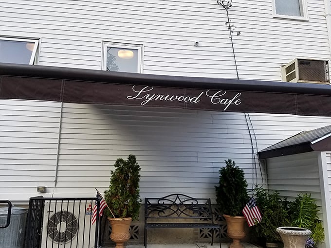 Lynwood Cafe's awning offers a touch of elegance to this humble building &ndash; like wearing your Sunday best to eat world-class pizza.