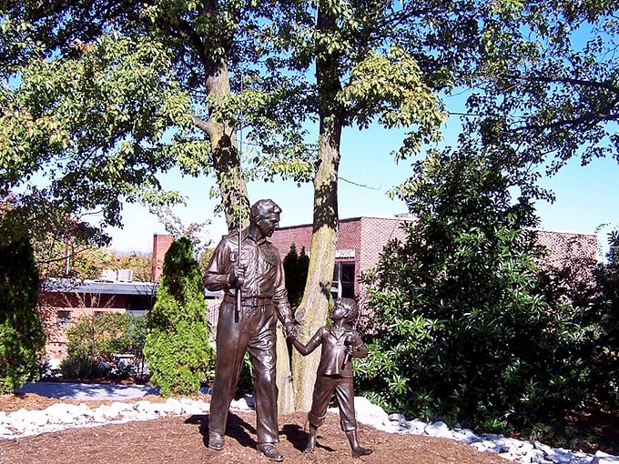 Take a stroll through history and relive a classic TV moment with this life-sized bronze statue of Andy and Opie.