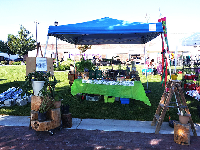 White tents and green grass create the perfect shopping backdrop. Nampa's market combines the best of both worlds.