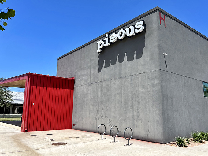 Pieous: "Architectural minimalism meets pizza maximalism. That striking red and gray exterior hints at bold flavors within!"