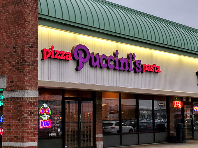 Puccini's purple signage glows with such operatic brilliance, you half expect your pizza to arrive with a soprano singing its praises.