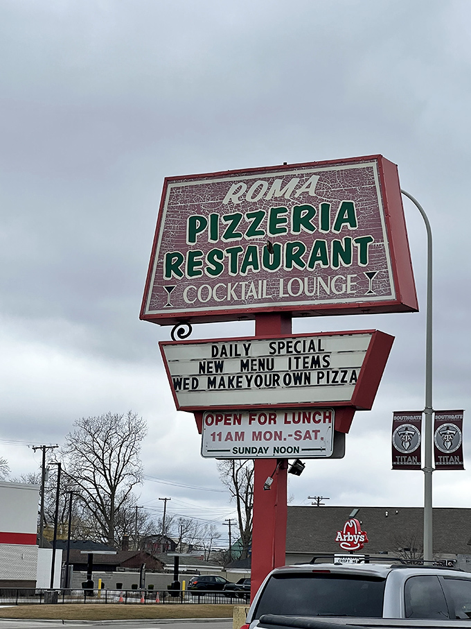 Roma's vintage sign promises daily specials and Wednesday pizza creativity – a midweek bright spot.