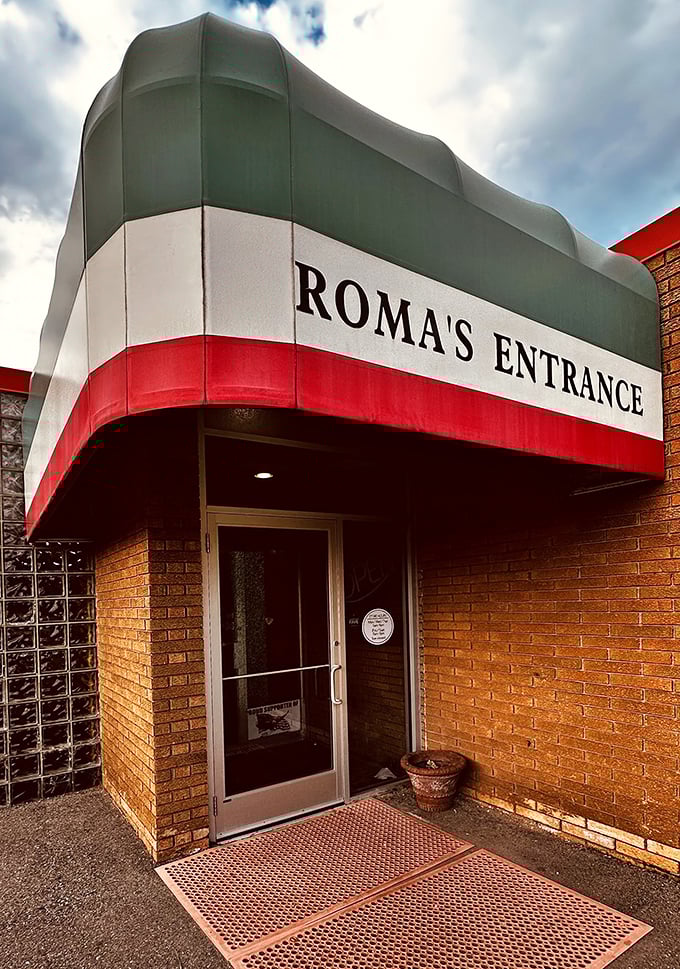The Italian flag awning says it all! Roma's entrance is like a portal to pizza paradise.