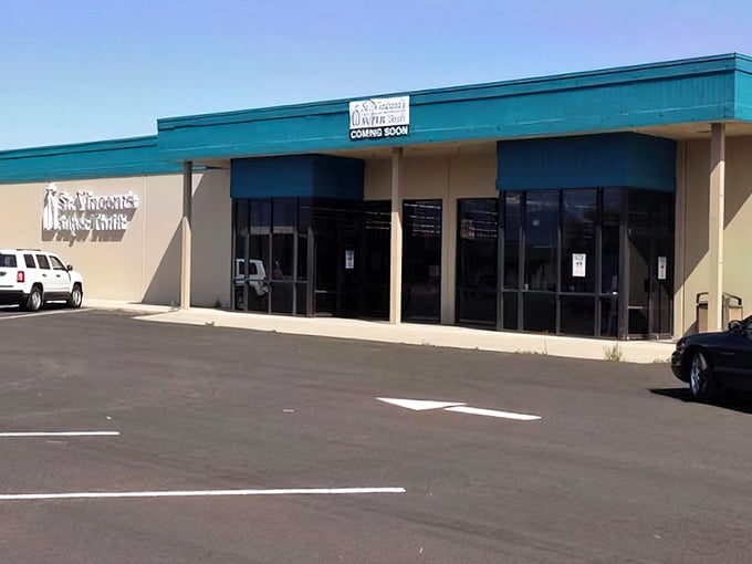 St. Vincent's teal awnings signal the calm before the bargain storm. Prepare to hunt for hidden gems!