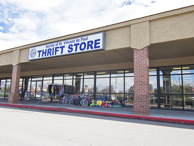 St. Vincent de Paul's welcoming storefront displays bicycles and toys outside. Like Christmas morning for the budget-conscious shopper!