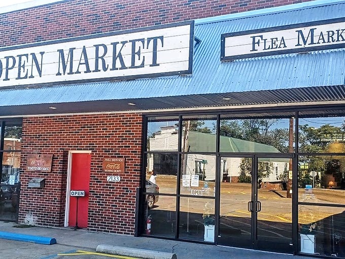 The Open Market's brick facade promises big-city treasures at small-town prices. That red door is basically a portal to bargain wonderland.