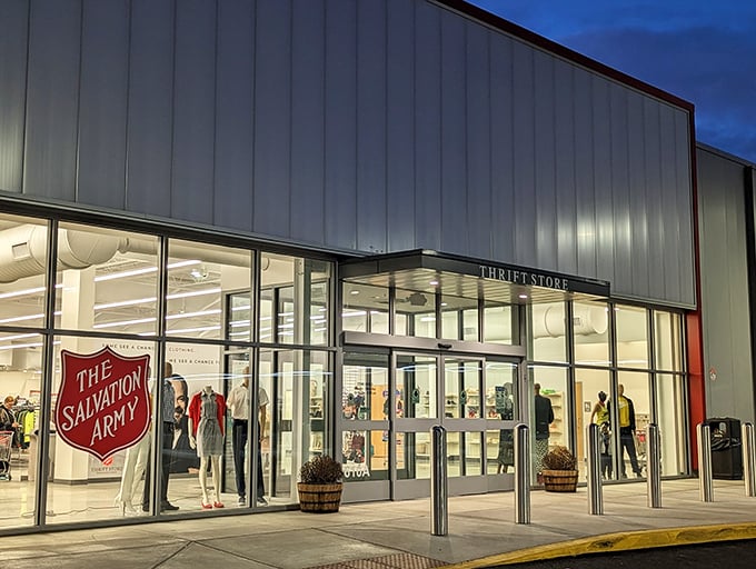 The Salvation Army's modern glass storefront gleams in the evening light &ndash; thrifting has never looked so sophisticated!