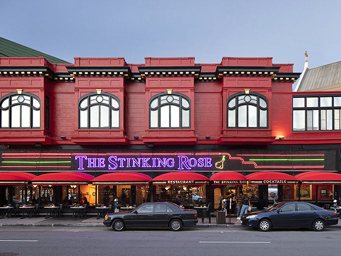 The Stinking Rose: Vampires beware! This garlic-lover's paradise glows with inviting purple neon against its classic red brick exterior.