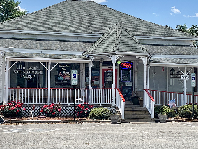 Village Steakhouse's charming cottage exterior feels like it should be in a fairy tale&mdash;"Goldilocks and the Three Bears Who Knew How to Cook a Perfect Steak."
