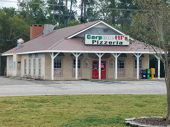 The cream walls and red doors of Carpenetti's create a storybook setting for pizza that's anything but a fairy tale&mdash;it's deliciously real.