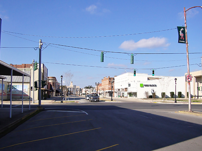 Historic buildings line Crowley's main street like a living museum where every brick tells a story of the town's prosperous rice-farming past.