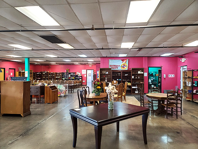 Pink walls and vintage furniture create an Instagram-worthy interior. Mid-century modern meets millennial pink in perfect harmony.