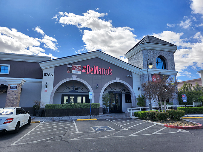 The stately entrance of Dom DeMarco's promises a pizza experience that's a cut above the ordinary. 