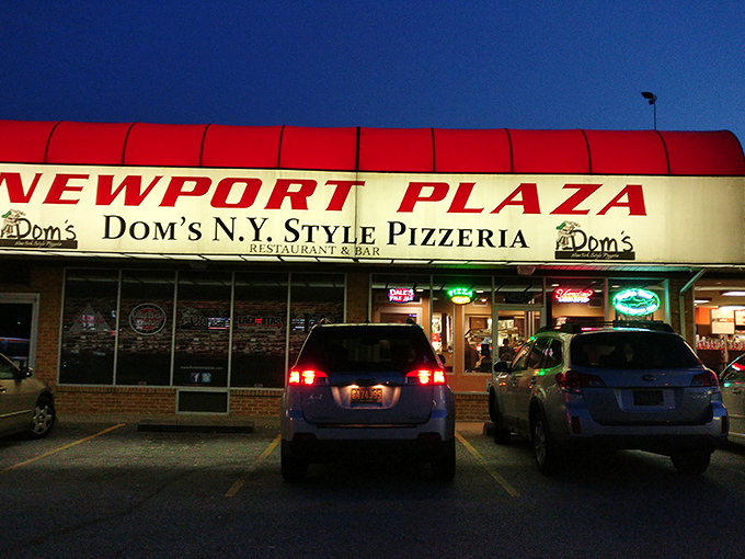 When the neon lights come on at Dom's, it's showtime for some of the most authentic NY-style pizza this side of Manhattan.