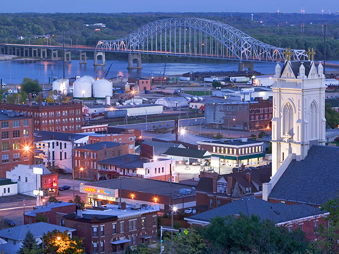 This stunning twilight view showcases Dubuque, Iowa, with its beautiful cityscape along the Mississippi River.