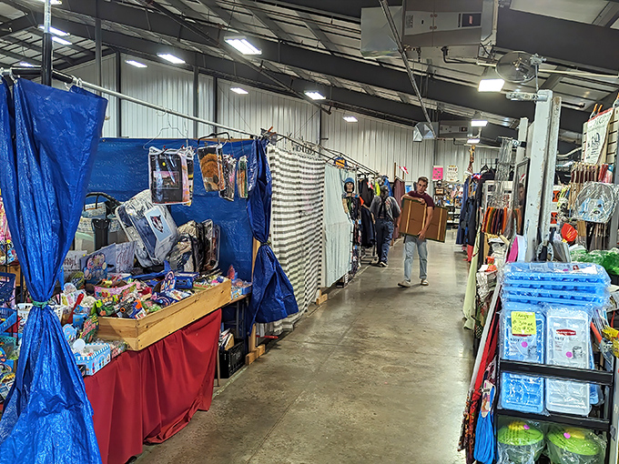 Blue tarps create a makeshift marketplace at Four Seasons' outdoor section. The temporary nature makes each find feel more special&mdash;here today, someone else's treasure tomorrow!
