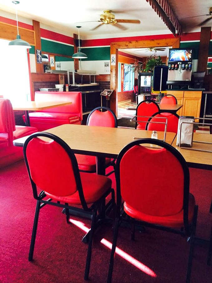 Those red chairs have supported generations of pizza lovers enjoying Frank's square-cut slices. Some traditions need no updating!