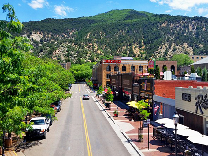 The Denver Beer Co building anchors Glenwood Springs' downtown, where mountain views come free with every reasonably-priced pint.