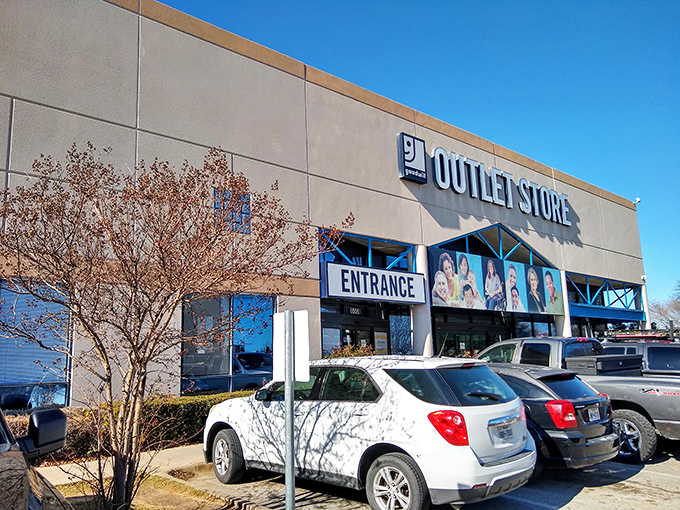 The modern facade belies the treasure hunt waiting inside. Goodwill's outlet store is where the serious thrifters compete.