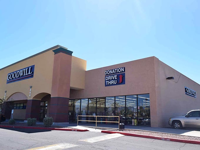 The desert sun illuminates this Goodwill's entrance, promising air-conditioned treasure hunting inside &ndash; Arizona's favorite indoor sport.