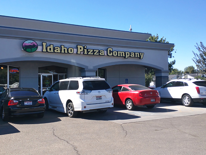 Simple storefront, serious pizza credentials. The Idaho-shaped logo tells you they're proudly local before you take your first bite.