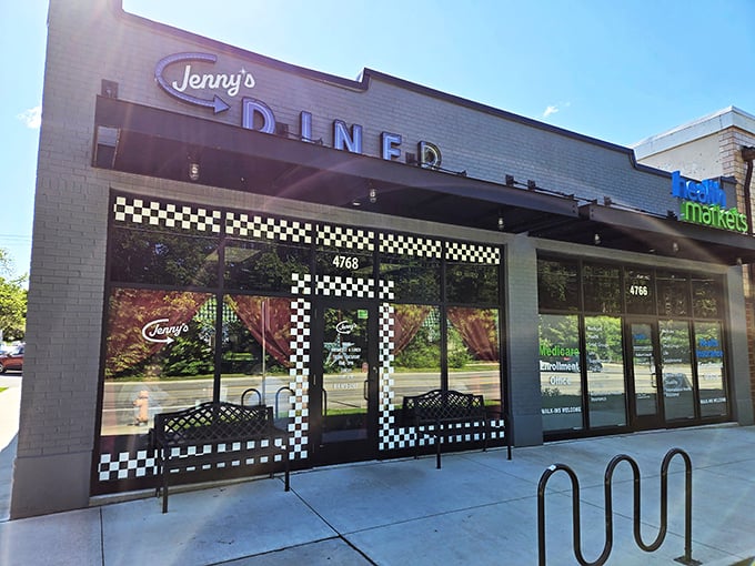 The black and white checkerboard pattern isn't just decoration&mdash;it's a promise that traditional diner goodness awaits inside.