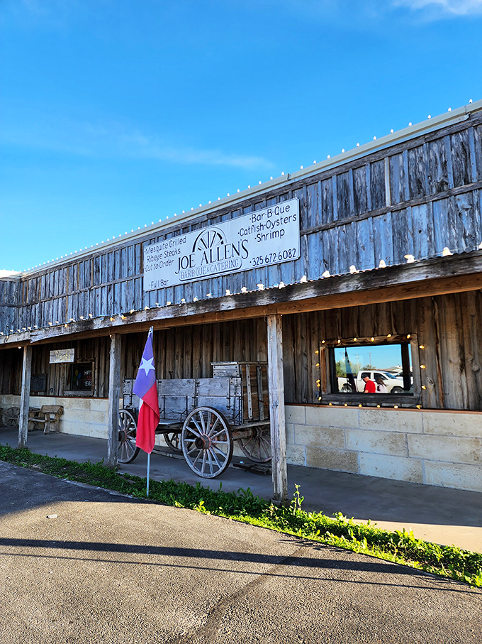 That old wagon out front isn't just decoration – it's a time machine to when Texas beef ruled the West.