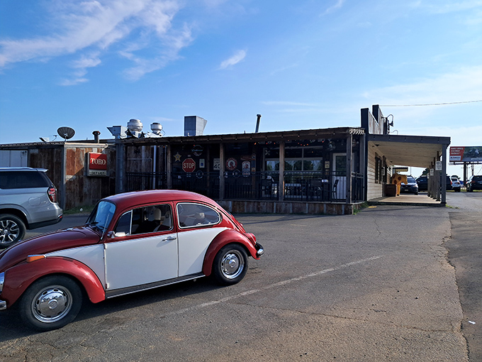 The classic small-town pizza joint exterior promises the kind of authentic experience that chain restaurants can only dream about. 