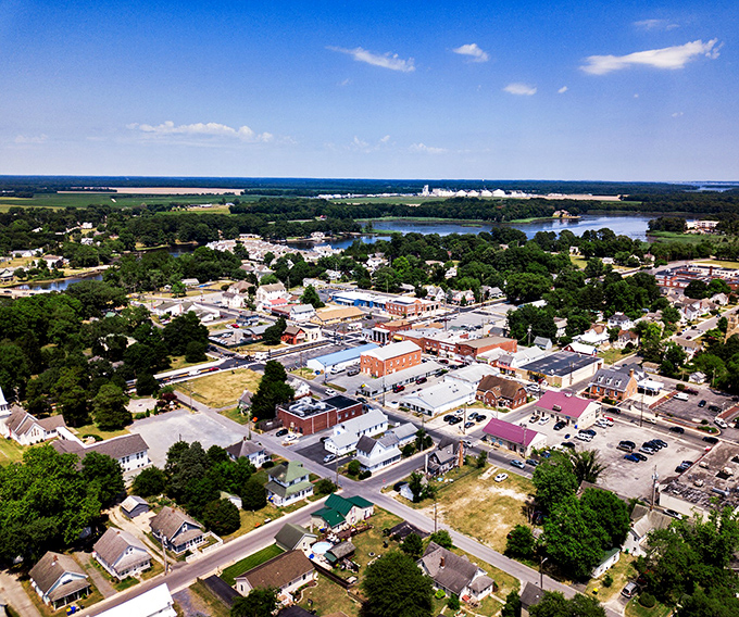 Millsboro's aerial view reveals a town where waterfront living doesn't require a CEO's retirement package. Social Security checks actually work here!