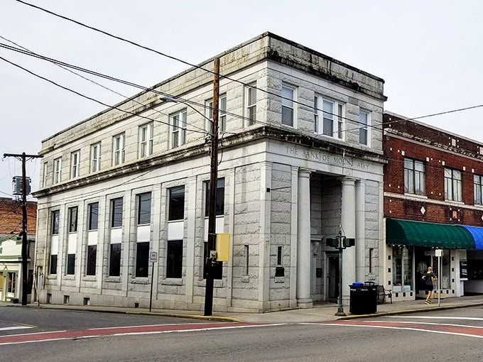 The clock tower stands sentinel over a town where time moves slower and living costs stay refreshingly reasonable.