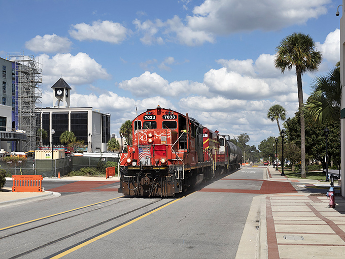 A bright red train cuts through downtown Ocala, a reminder that this charming city connects Florida's past with its present.